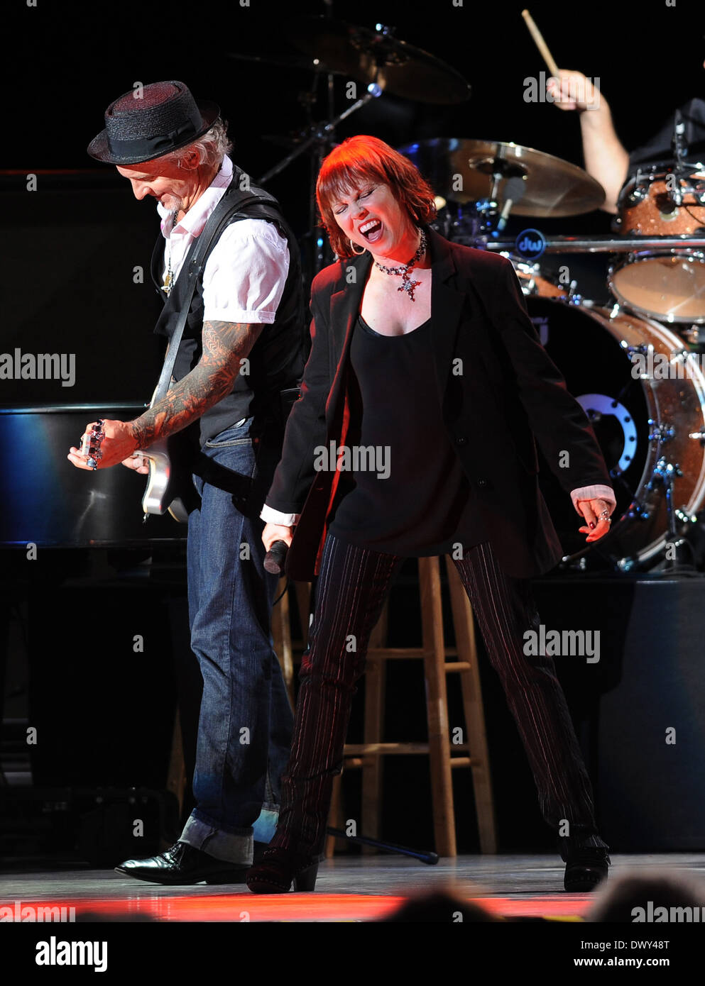 Pat Benatar and Neil Giraldo performing live at the 1-800-Ask-Gary ...