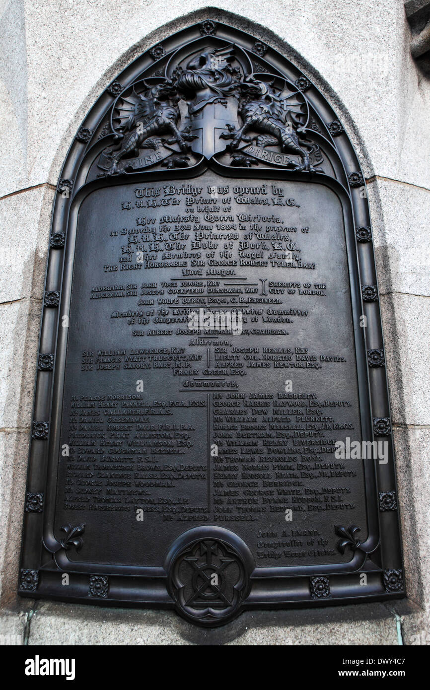 Plaque marking the opening of Tower Bridge in London, England Stock ...