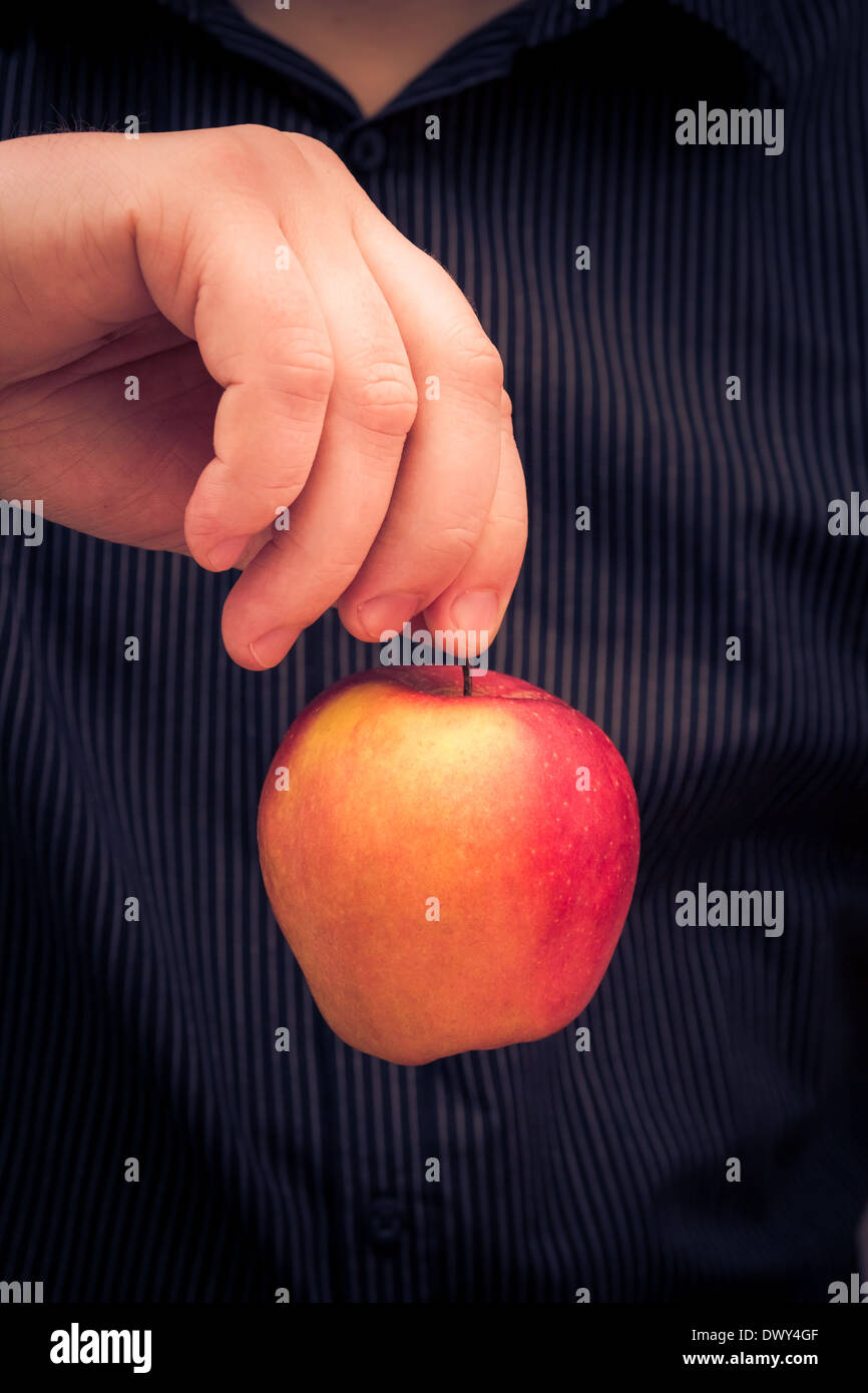 Hand holding apple symbol of natural hi-res stock photography and ...