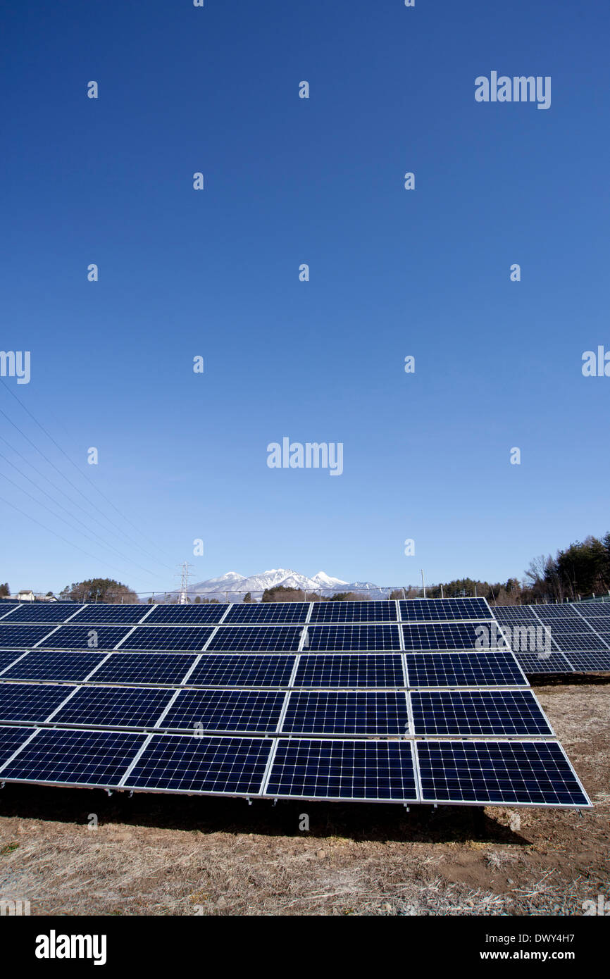 Solar panels and mountains covered by snow in Japan Stock Photo - Alamy