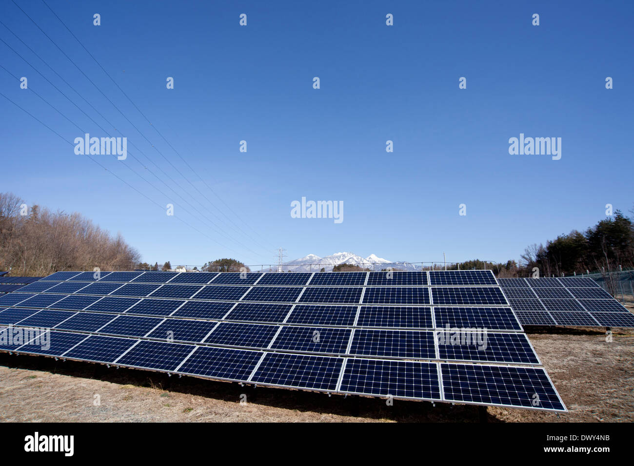 Solar panels and mountains covered by snow in Japan Stock Photo - Alamy