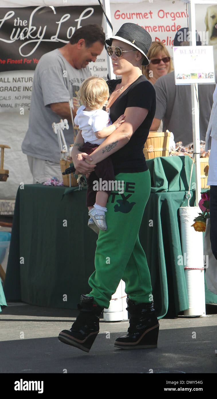 Pink real name Alecia Moore, carries her daughter Willow in her arms ...