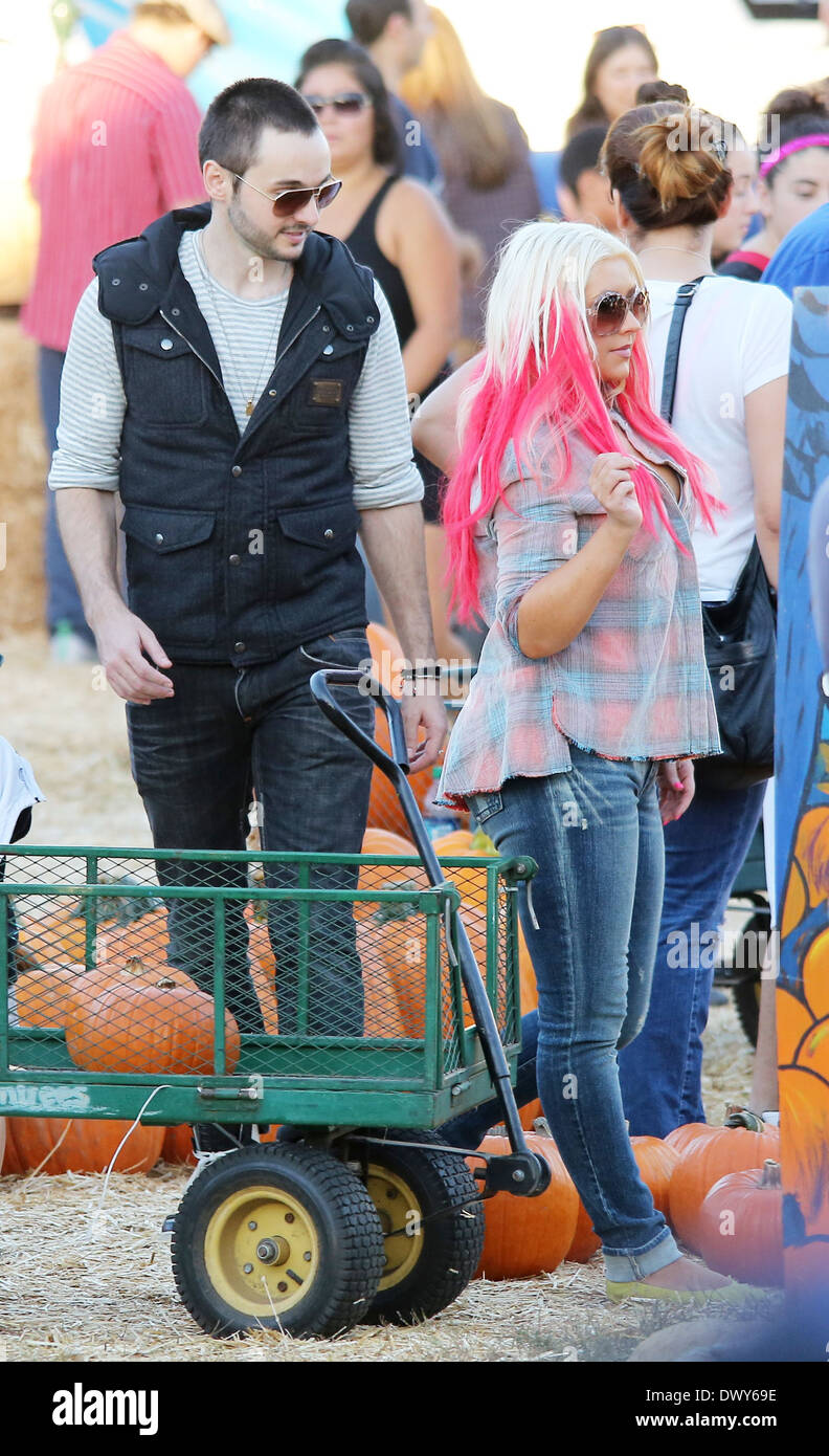 Christina Aguilera enjoys a day at Mr. Bones Pumpkin Patch with her son and boyfriend Matthew ...