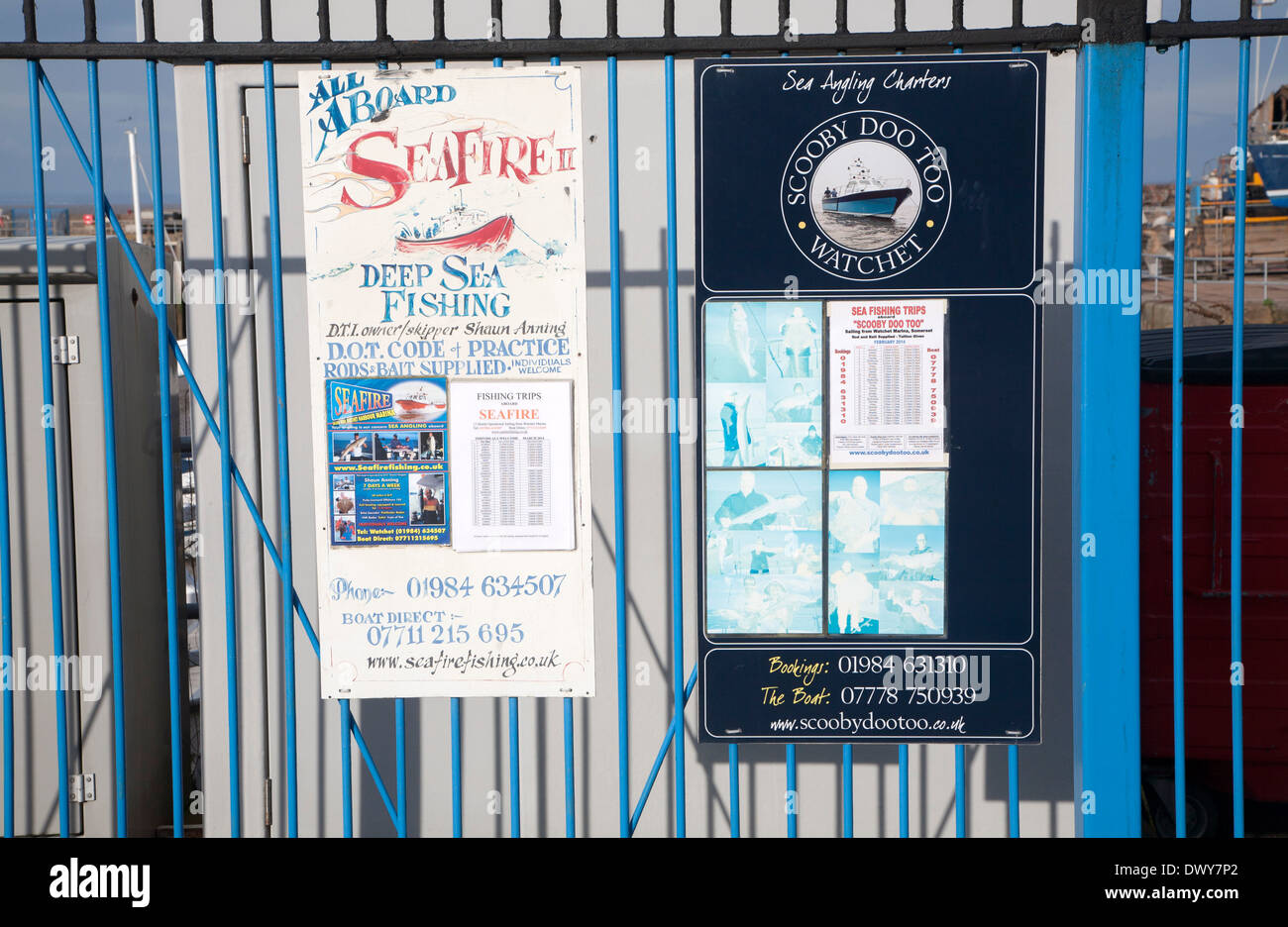 Signs for deep sea fishing trips at watchet hi-res stock photography ...