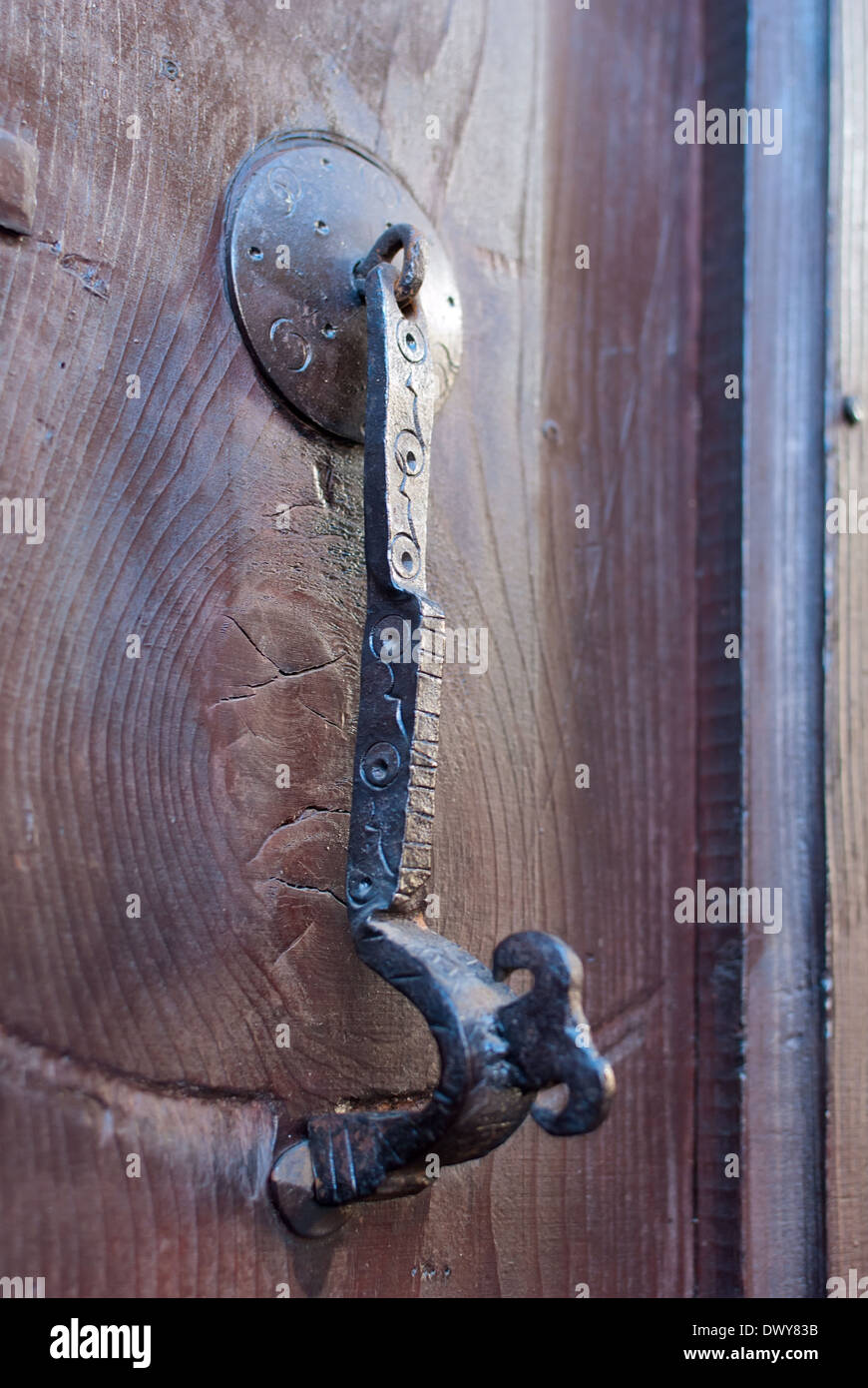 Old ornamental knocker hammer Stock Photo - Alamy