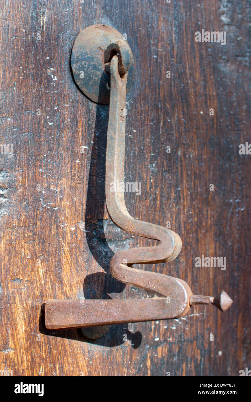 Old ornamental knocker hammer Stock Photo - Alamy