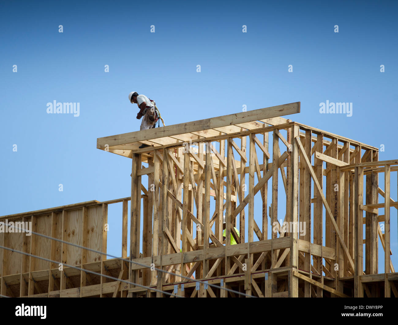 Workers working on a new building Stock Photo - Alamy