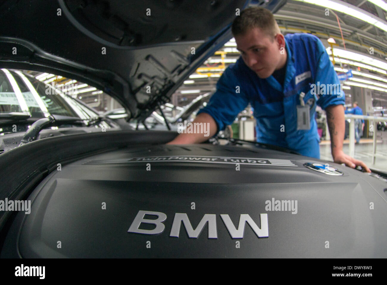 Regensburg, Germany. 13th Mar, 2014. A worker conducts a final ...