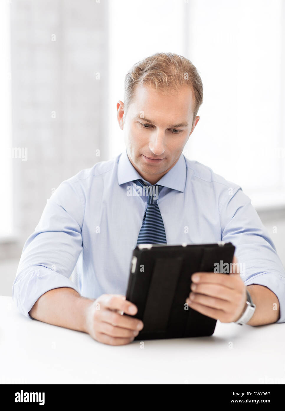 Businessman work tablet in modern Cut Out Stock Images & Pictures - Alamy