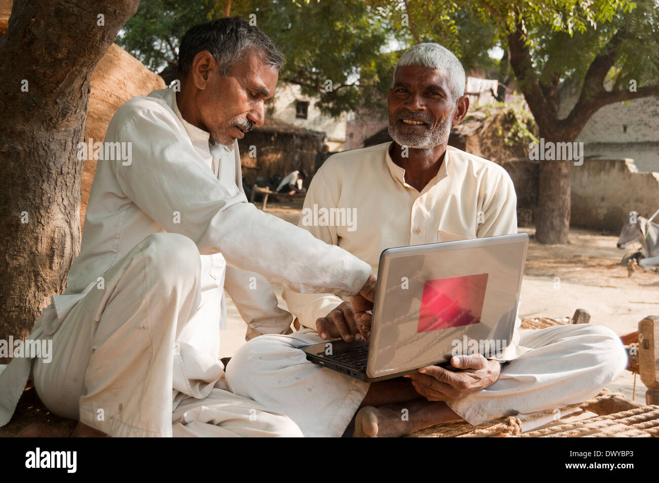 Indian Farmer Sitting at Home with Laptop Stock Photo - Alamy