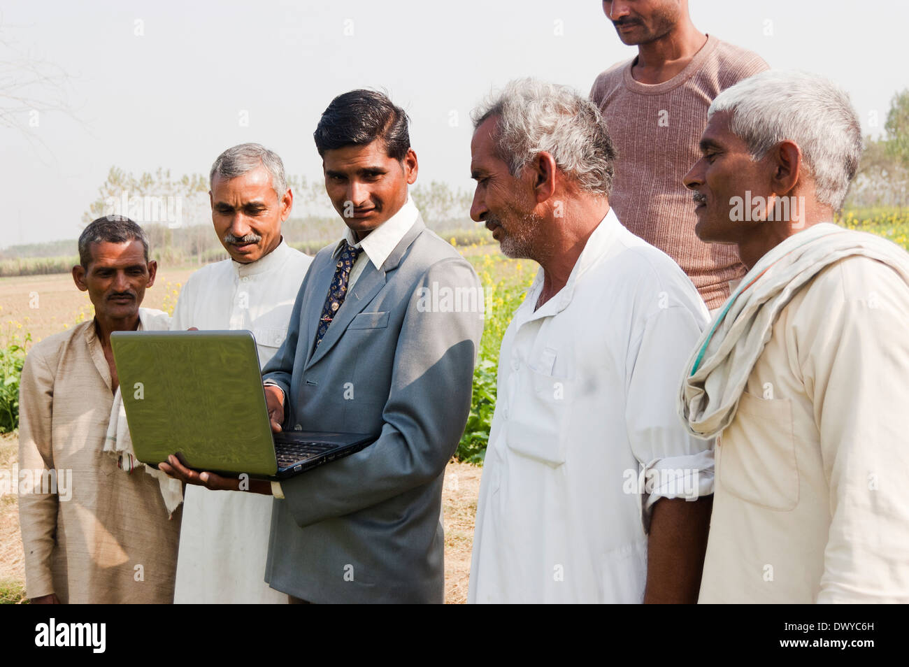 1 Indian Salesperson Advice to Indian Farmer Stock Photo - Alamy