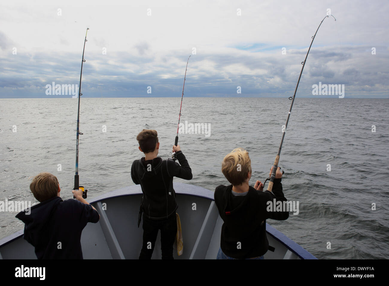 Wismar, Germany, young people on the deep-sea fishing on the Baltic Sea ...