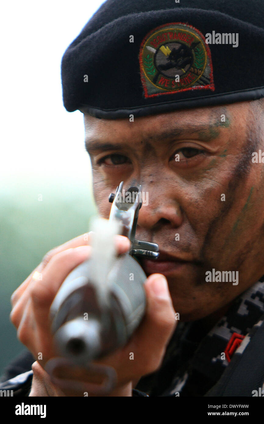 Quezon City, Philippines. 15th Mar, 2014. A scout ranger from the Armed ...