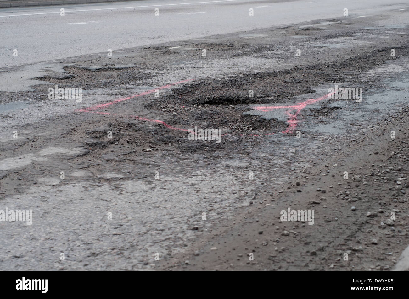 Big pothole hi-res stock photography and images - Alamy