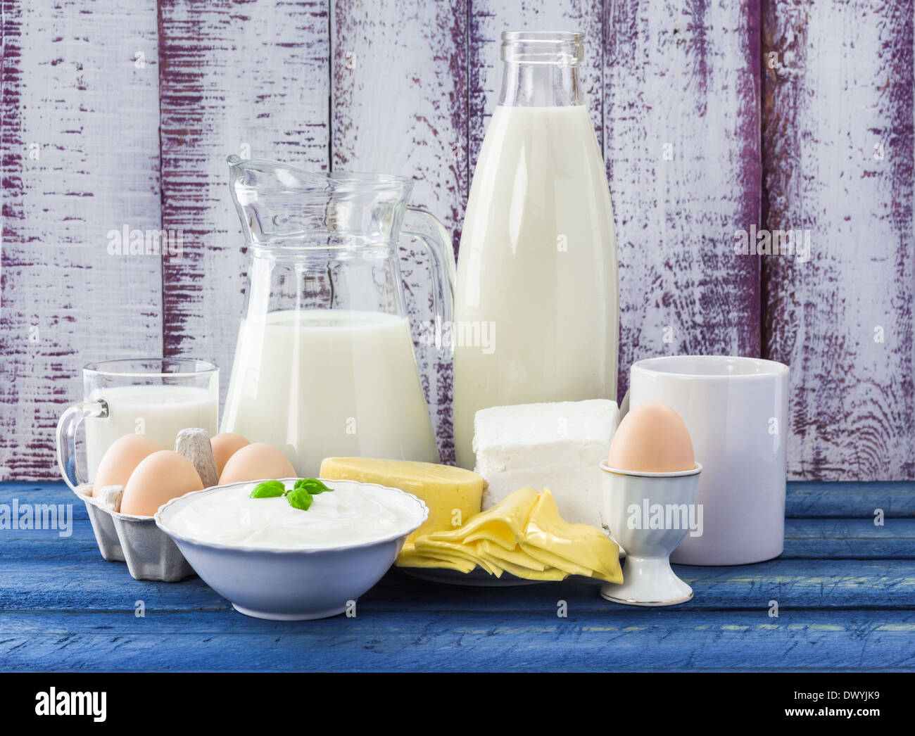 Milk and dairy products on a wooden background Stock Photo - Alamy