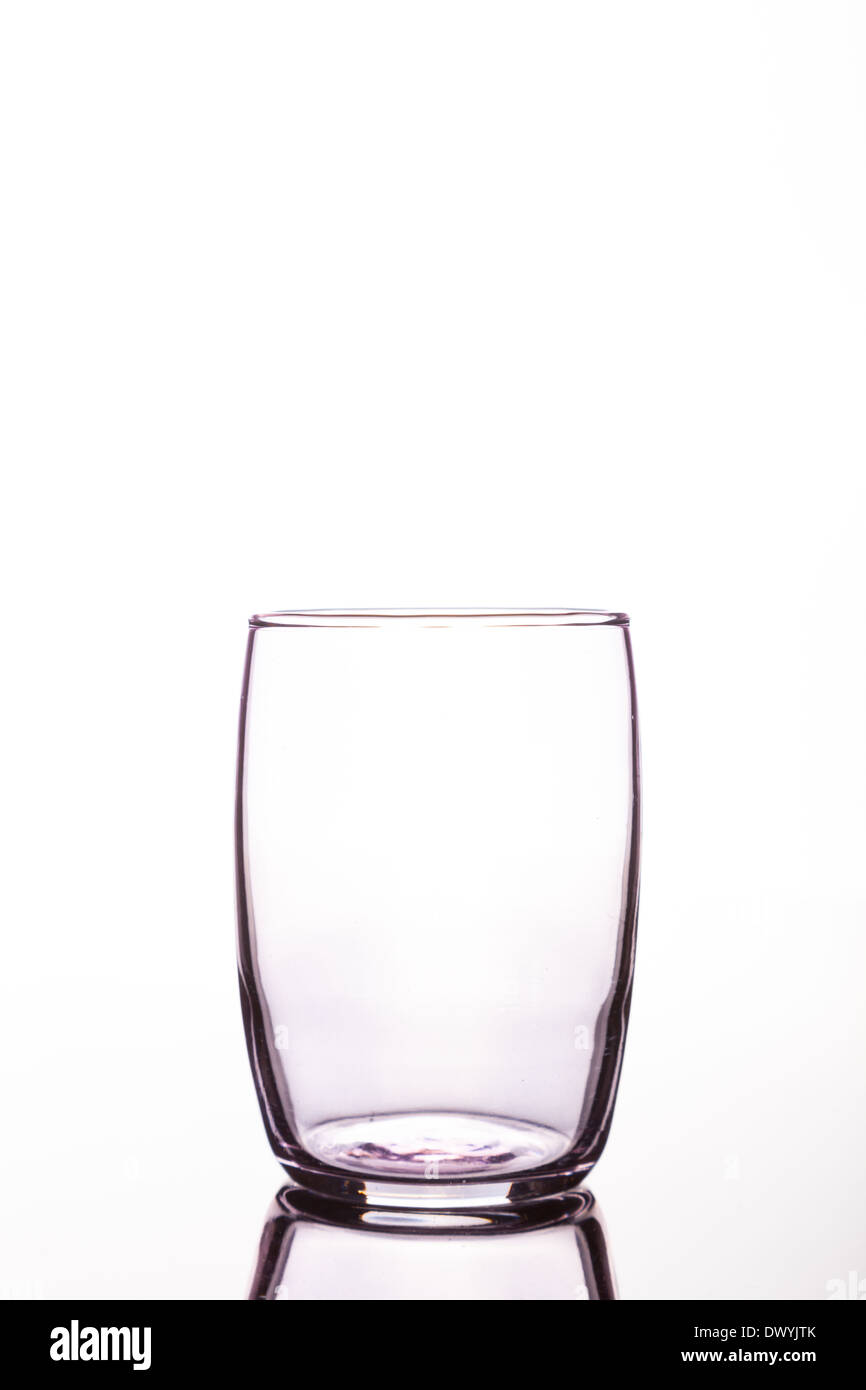 A clear glass with reflection on a white background Stock Photo - Alamy