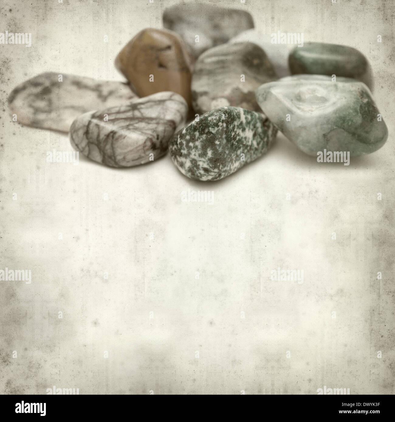 textured old paper background with semi-precious stones Stock Photo - Alamy