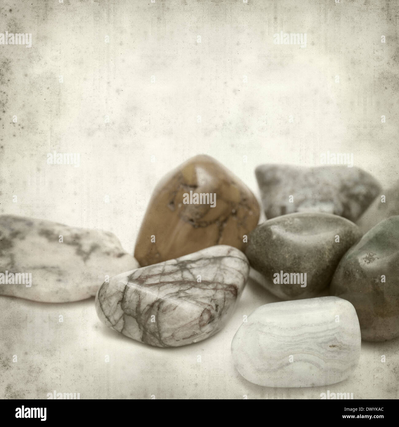 textured old paper background with semi-precious stones Stock Photo - Alamy