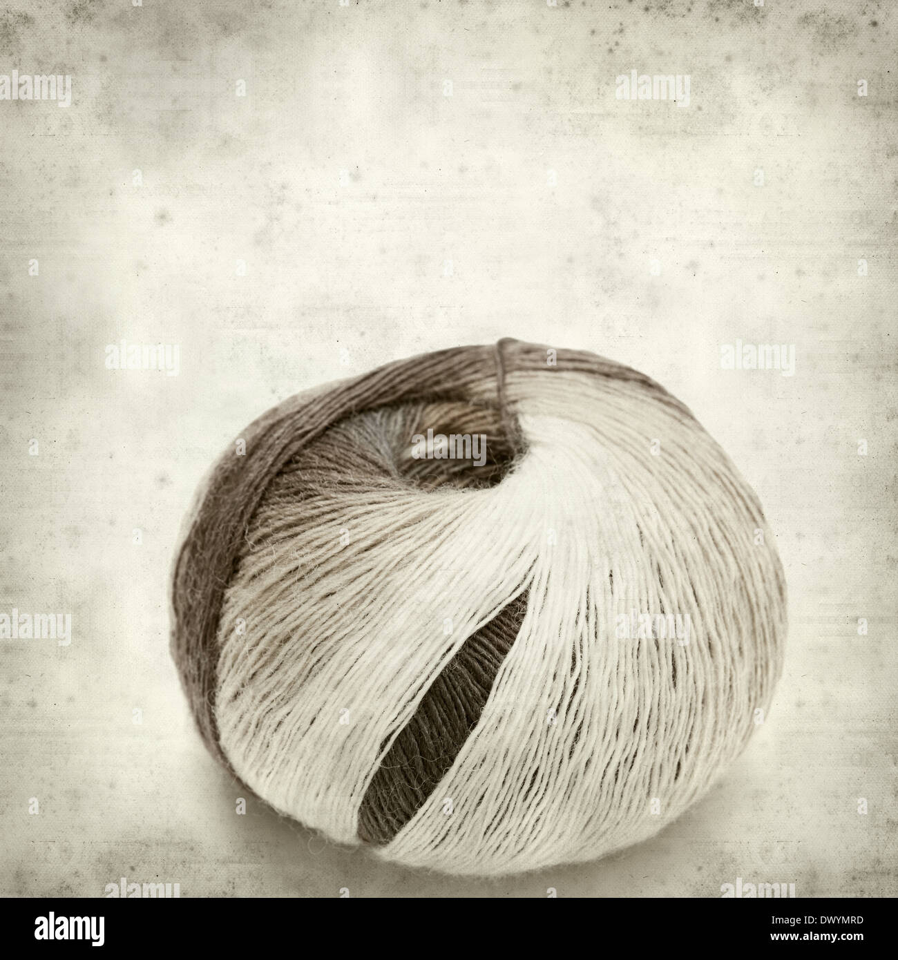 textured old paper background with knitting wool Stock Photo - Alamy