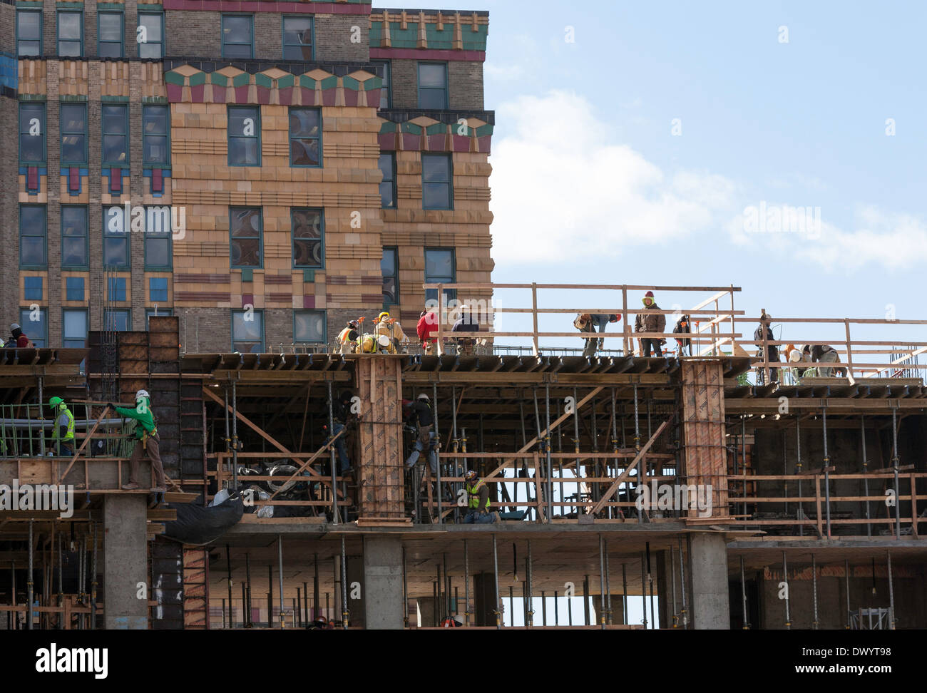 High-rise Building Construction Site, NYC with Tradesmen Stock Photo ...