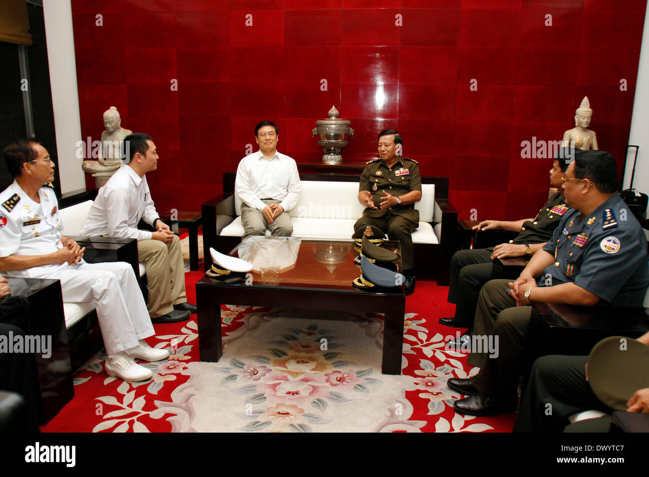 Phnom Penh, Cambodia. 15th Mar, 2014. Sun Jianguo (3rd L), deputy chief of general staff of the ...