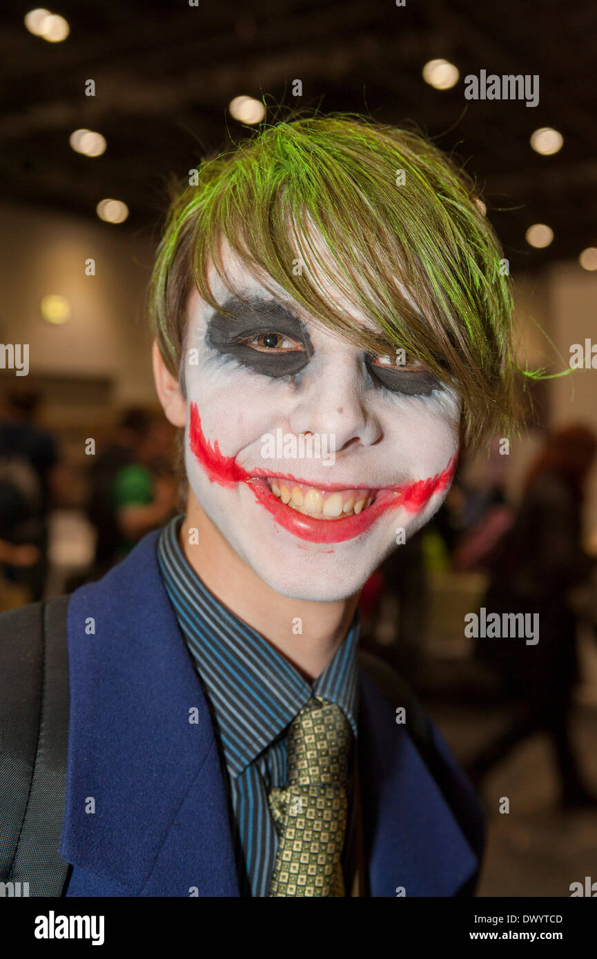 ExCel, London UK. 15th March, 2014. A visitor in cosplay as The Joker ...