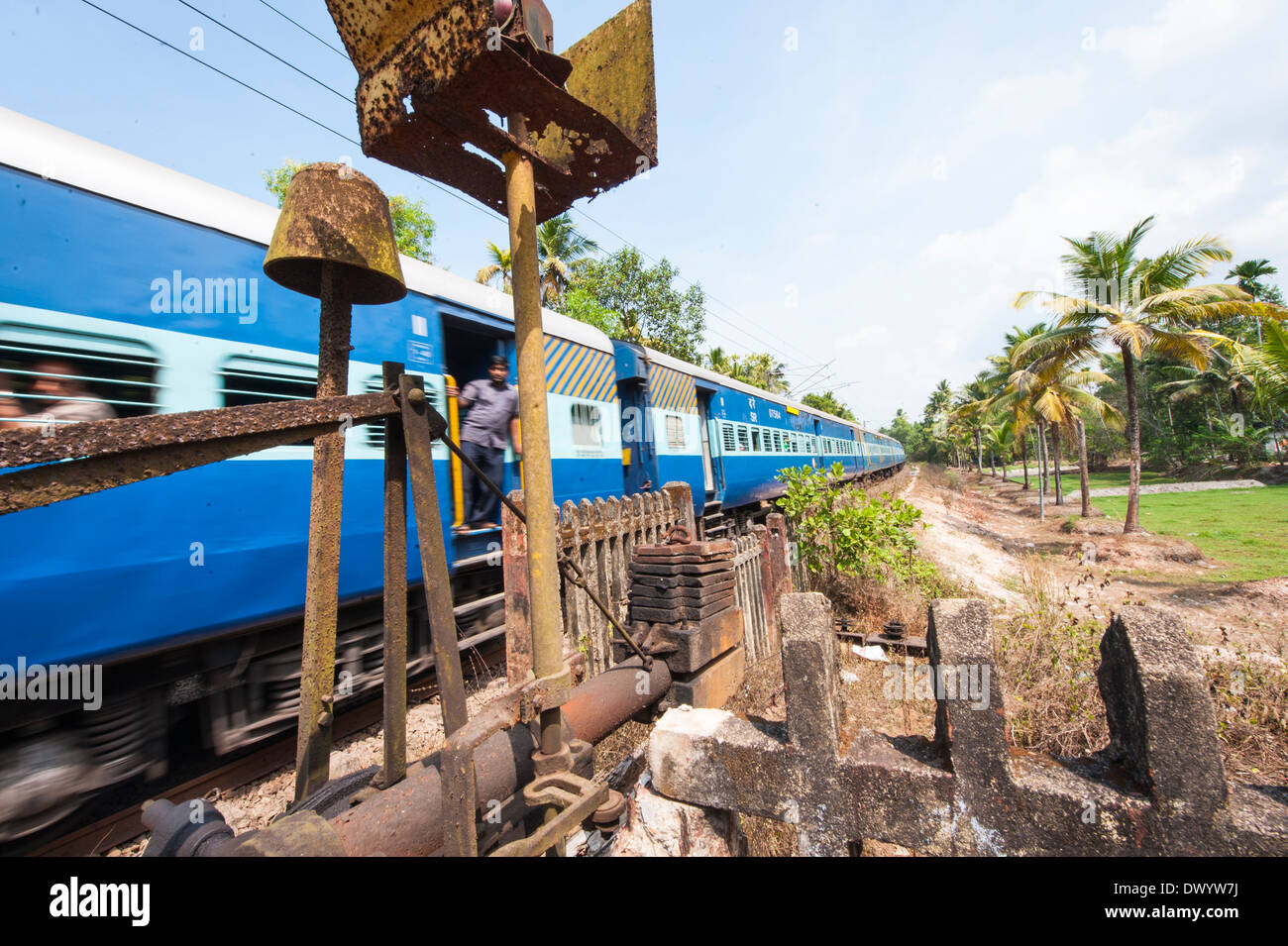 South Southern India Kerala commuter train blue carriages rushes rush ...