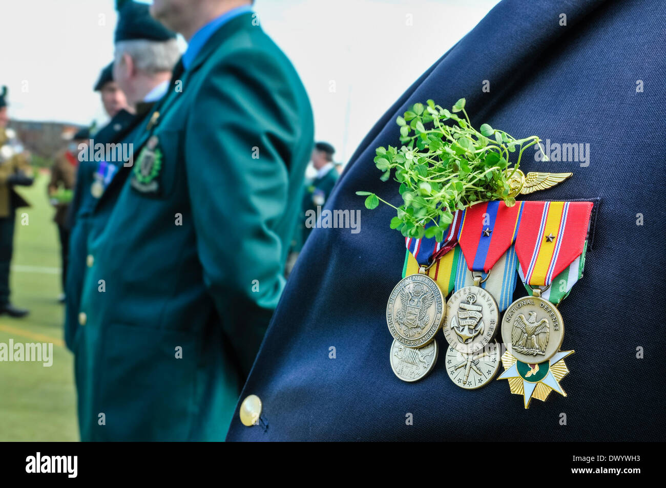 Lisburn, Northern Ireland. 15 Mar 2014 - An Old Comrade wears a sprig ...