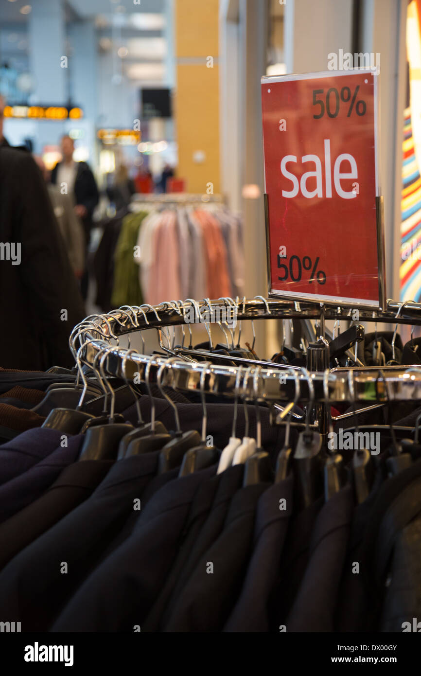 Sale sign announcing a 50% discount on clothes at retail store Stock ...