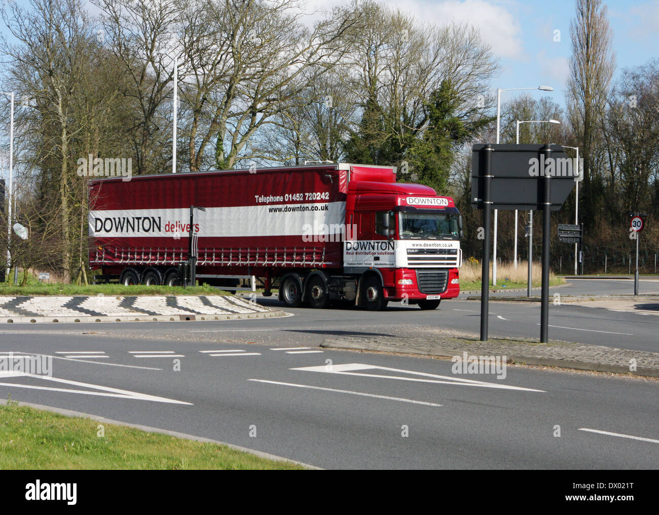 A truck traveling around a roundabout in Coulsdon, Surrey, England ...
