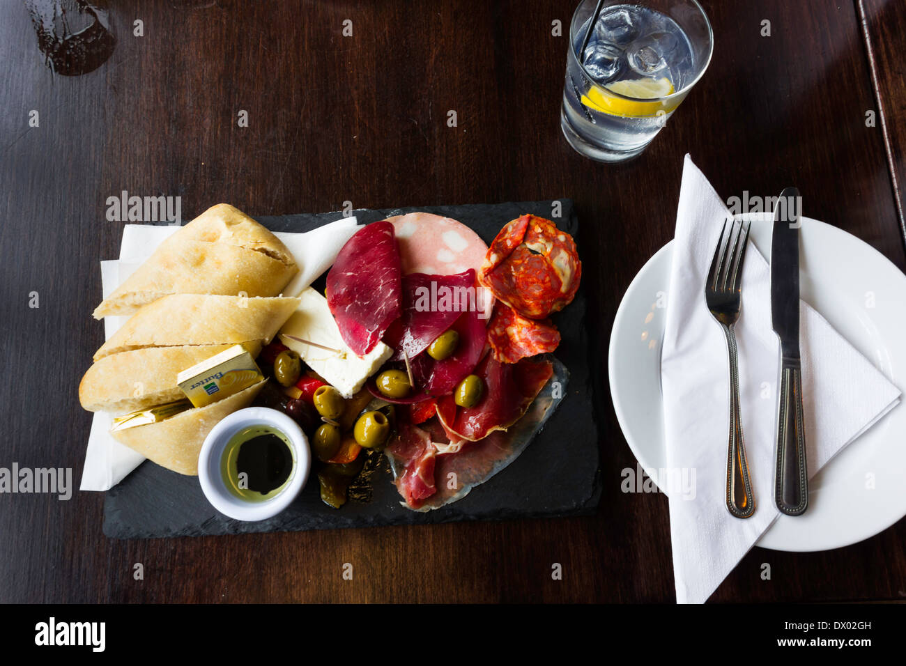 Lunch time snack meal deli platter cold meats mozzarella cheese ...