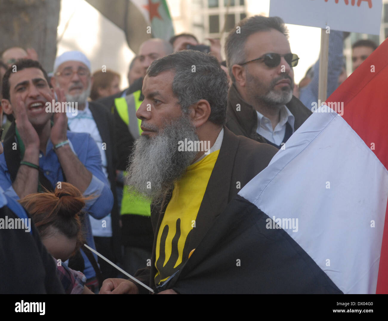 Syrians protest in large numbers outside Downing Street against Assad ...