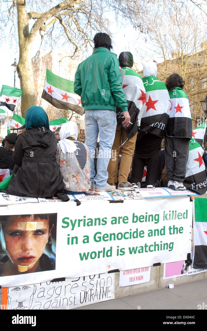 Syrians protest in large numbers outside Downing Street against Assad ...
