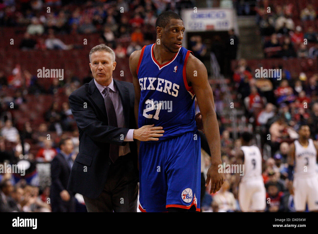 March 15, 2014: Philadelphia 76ers head coach Brett Brown walks with ...