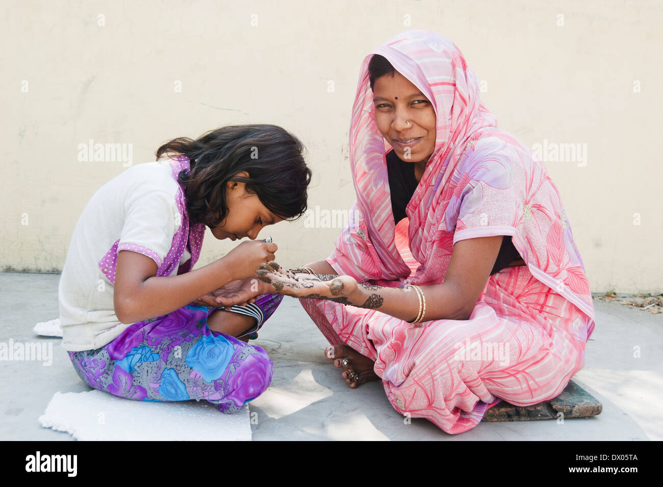 Mother Sitting With Kid At Home Stock Photo - Alamy