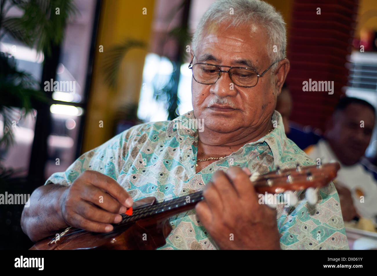 mandalin player in restaurant, Apia, Samoa Stock Photo - Alamy