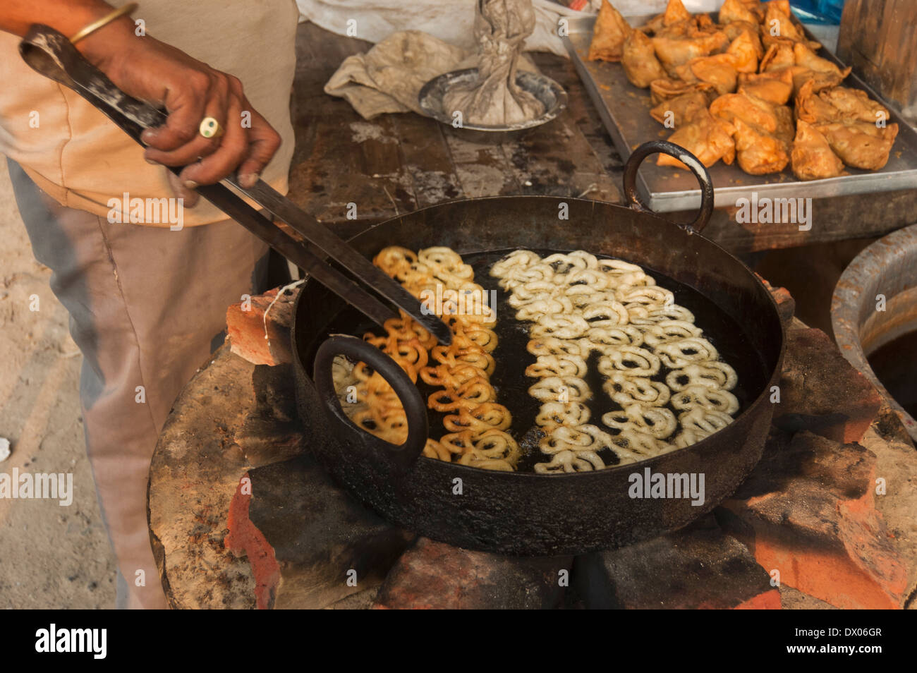 Hand full of sweets hi-res stock photography and images - Alamy