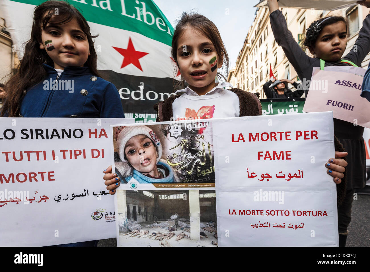 Rome, Italy – March 15, 2014: Syrian girls with colours of the Syrian ...