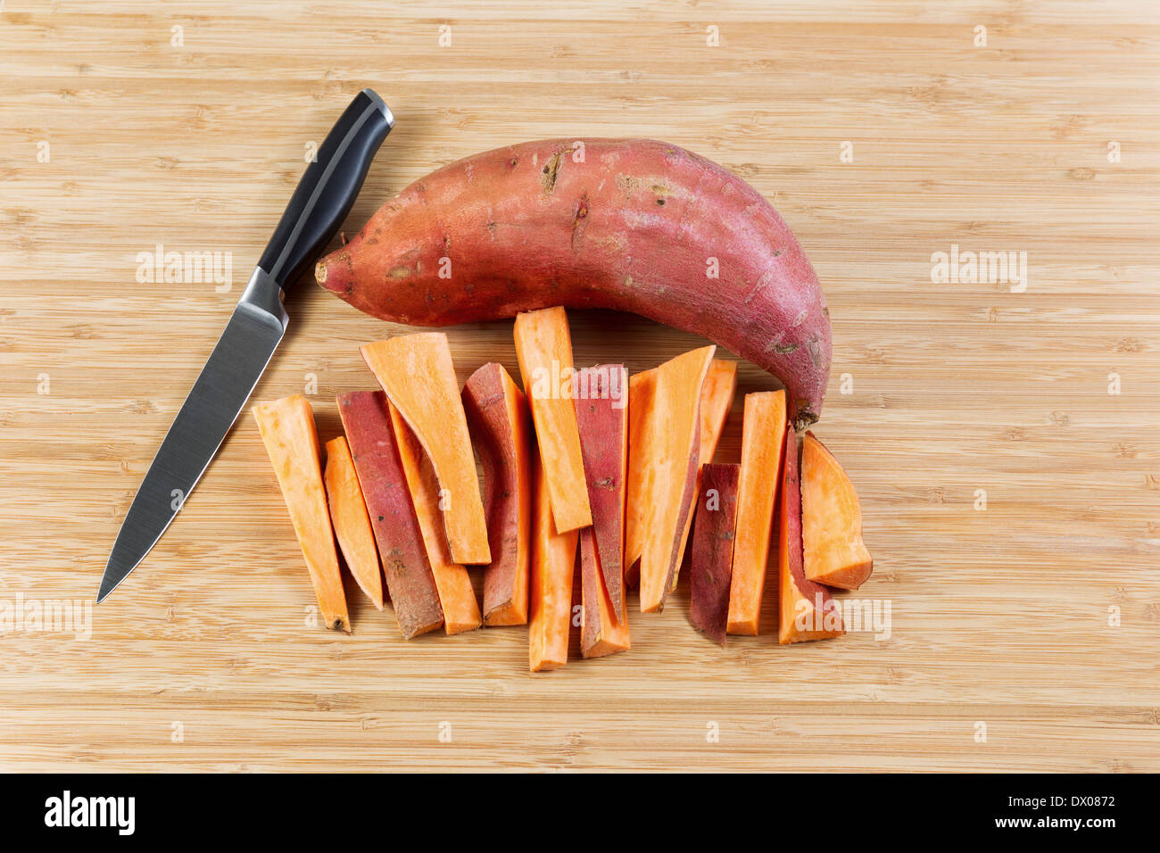 Horizontal photo of freshly cut Yams for cooking French fries with ...