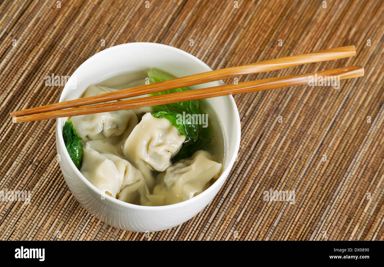 Close up horizontal top view photo of freshly made wonton with ...