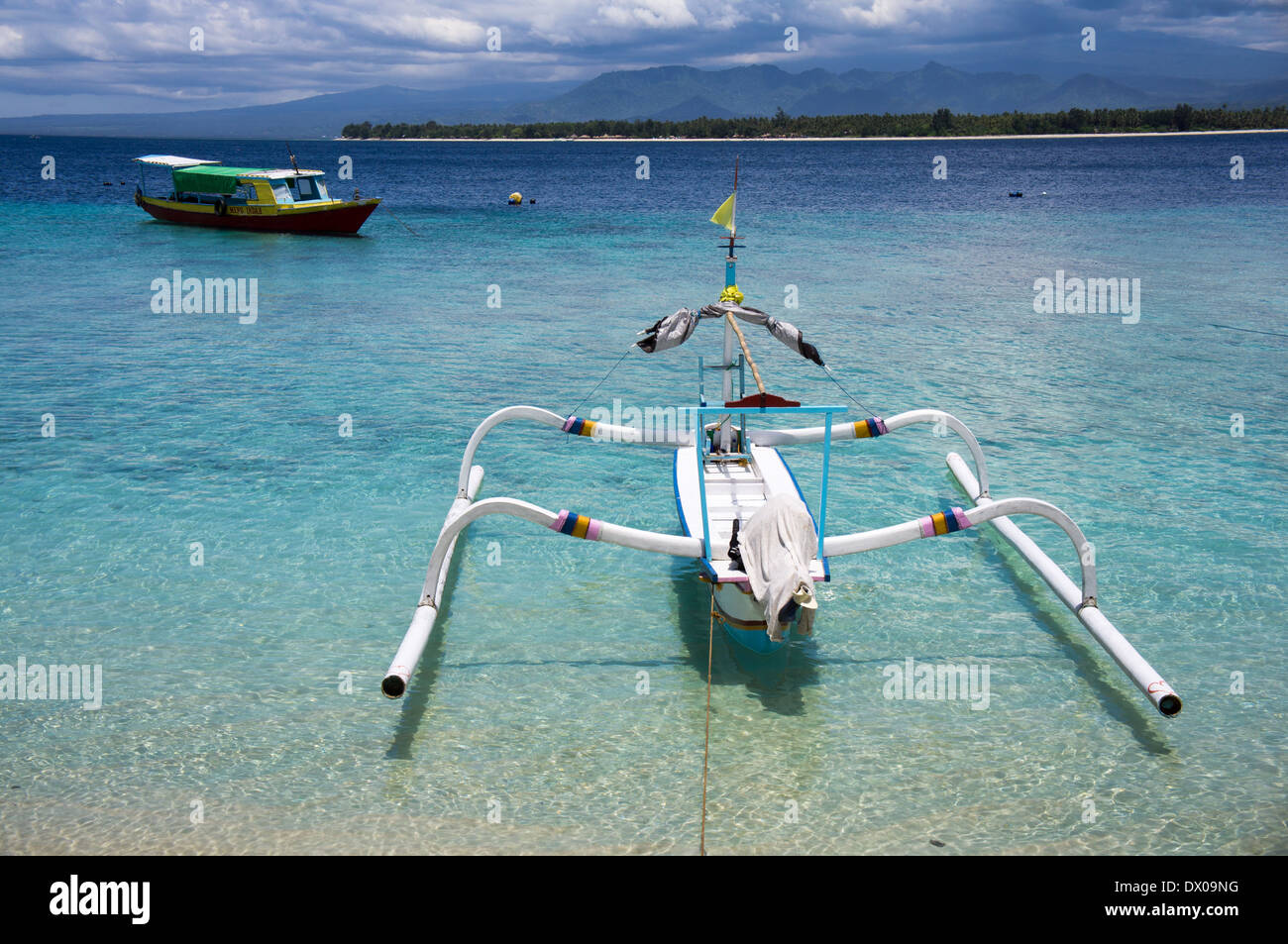 Traditional wooden fishing boat on the shore. Gili islands, Indonesia ...