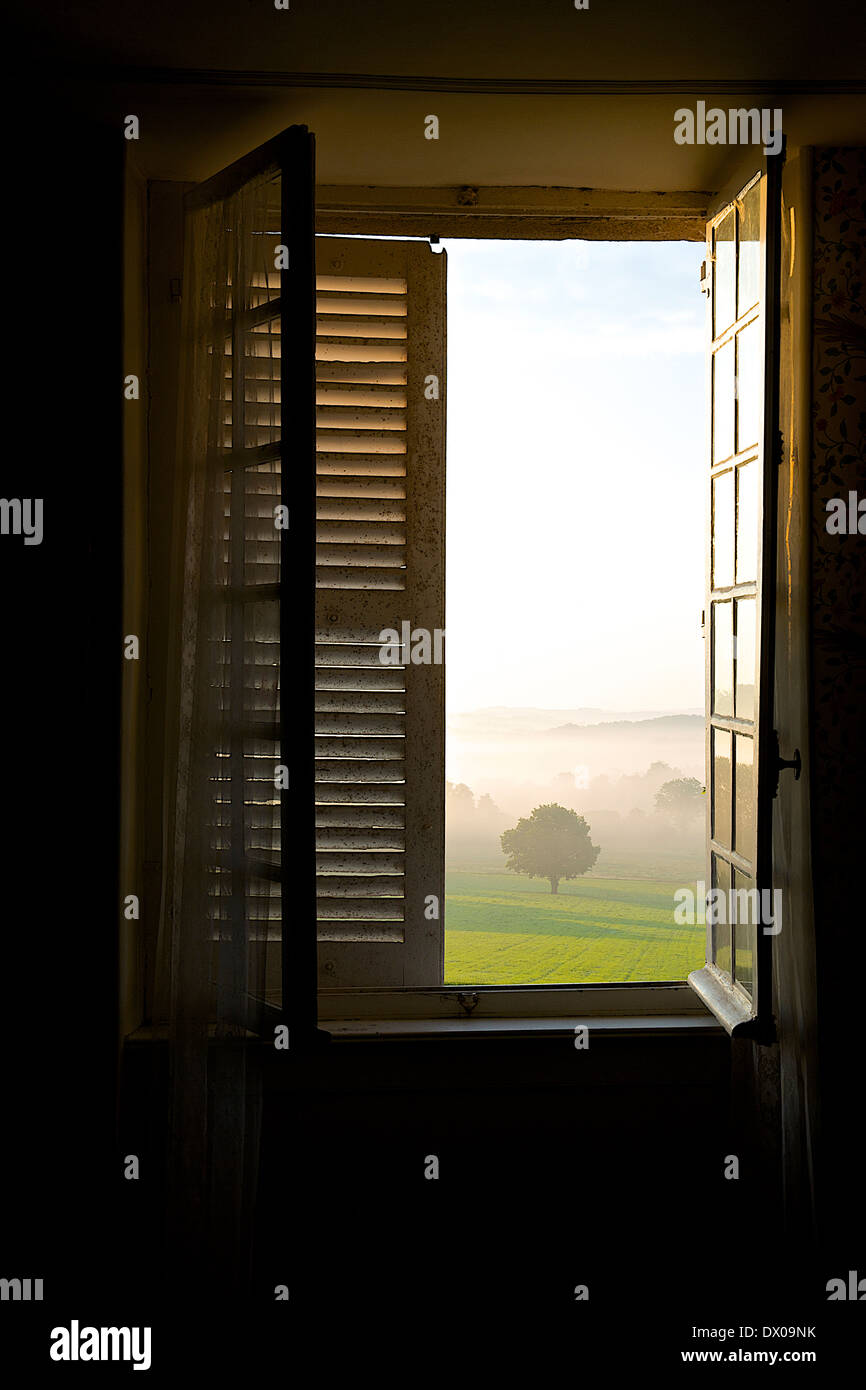 Countryside through window Stock Photo - Alamy