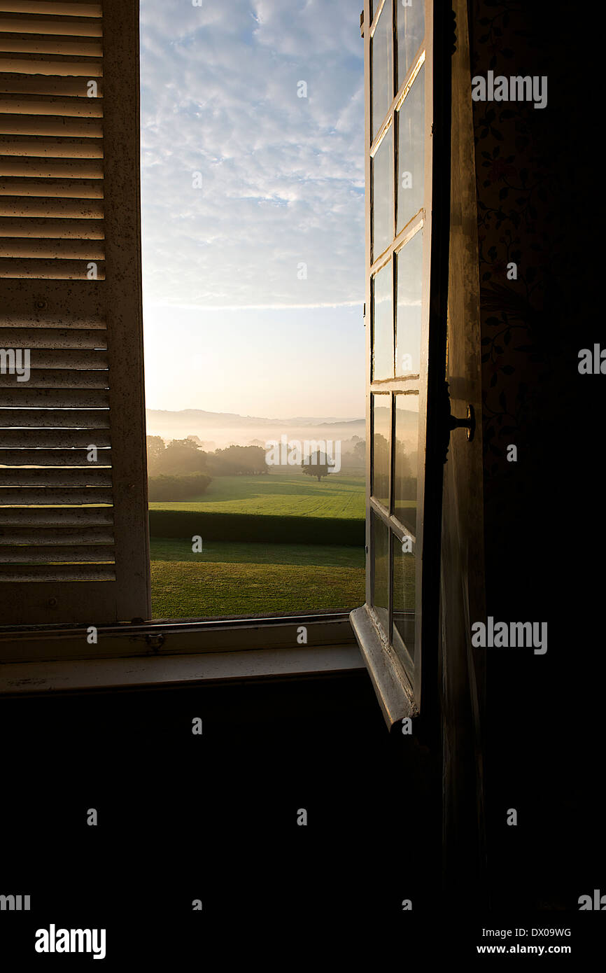 Countryside through window Stock Photo - Alamy