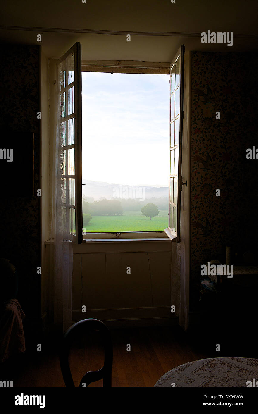 Countryside through window Stock Photo - Alamy