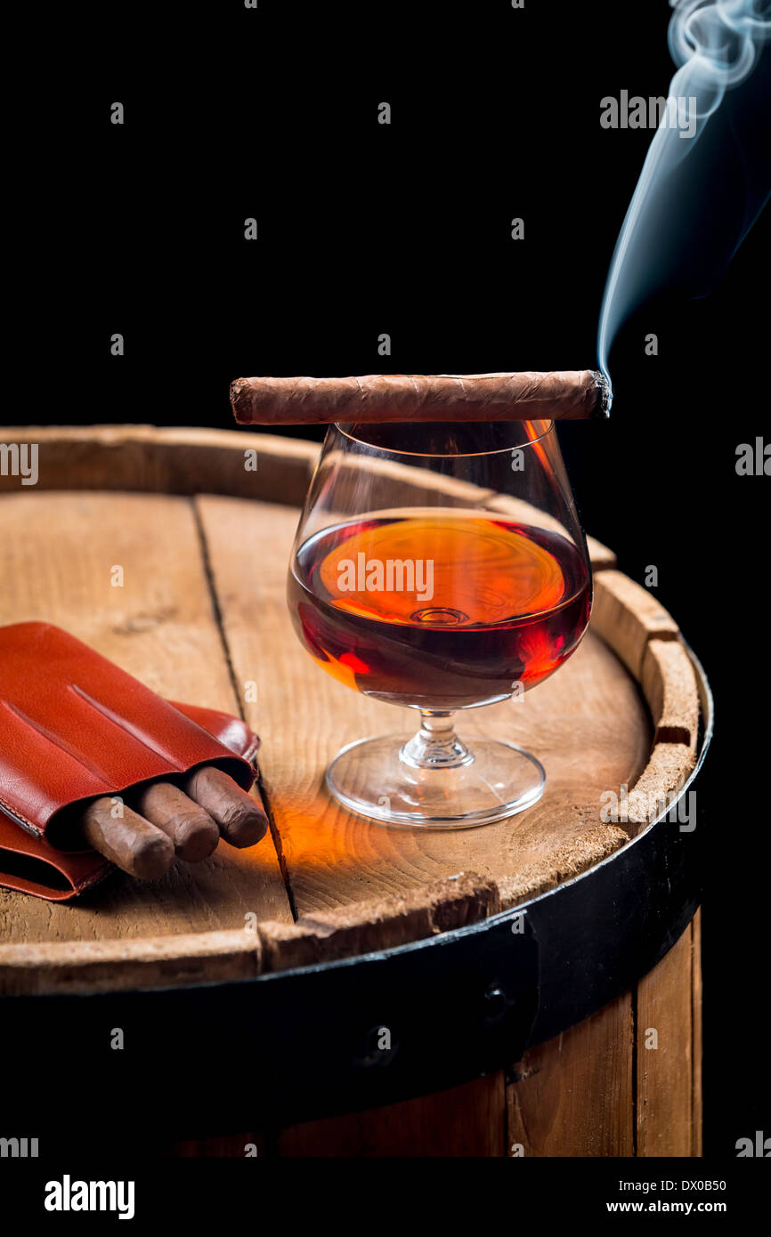 Taste of burnt cigar and cognac Stock Photo - Alamy
