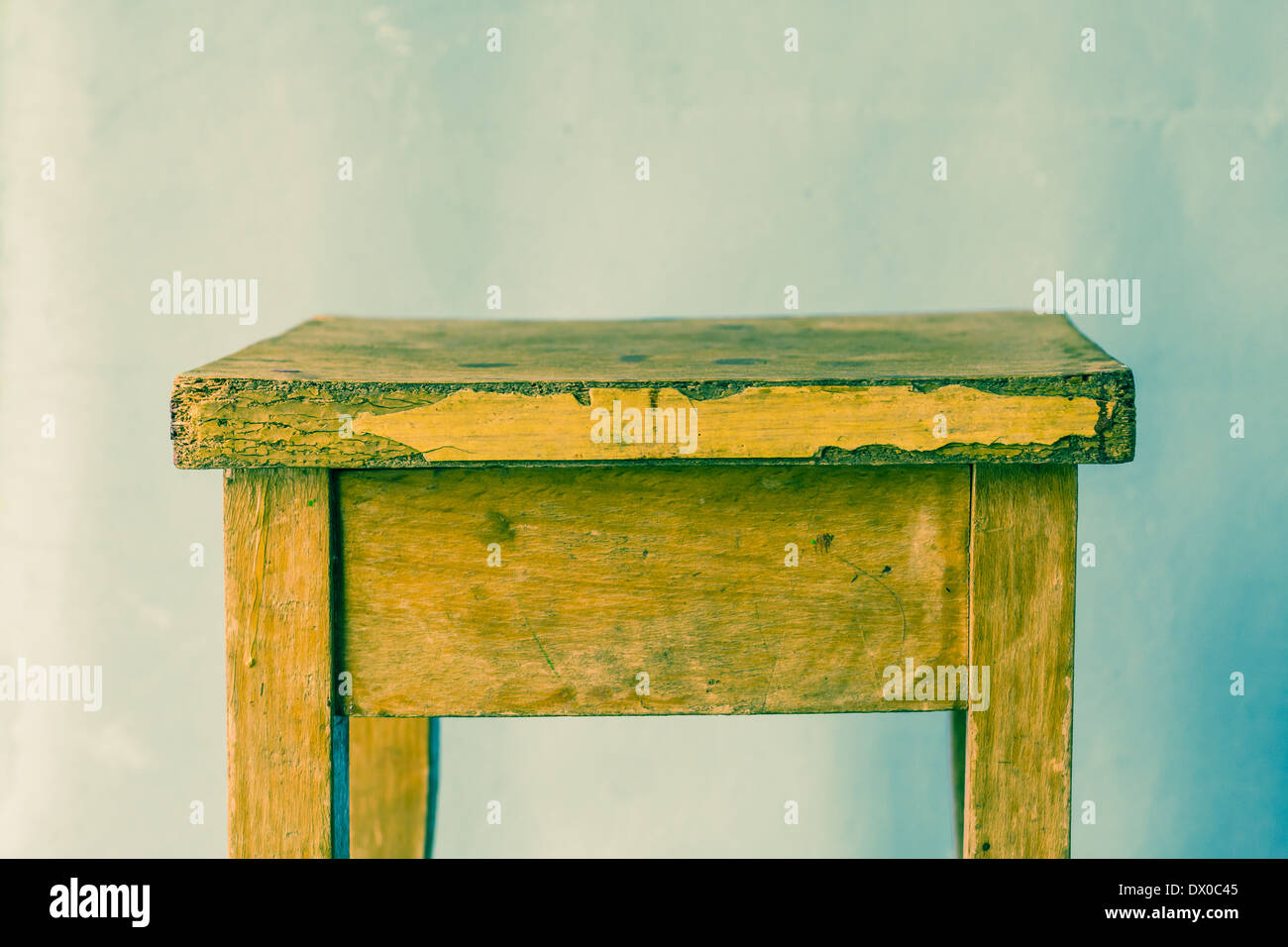 Old wooden table on a dirty background Stock Photo - Alamy