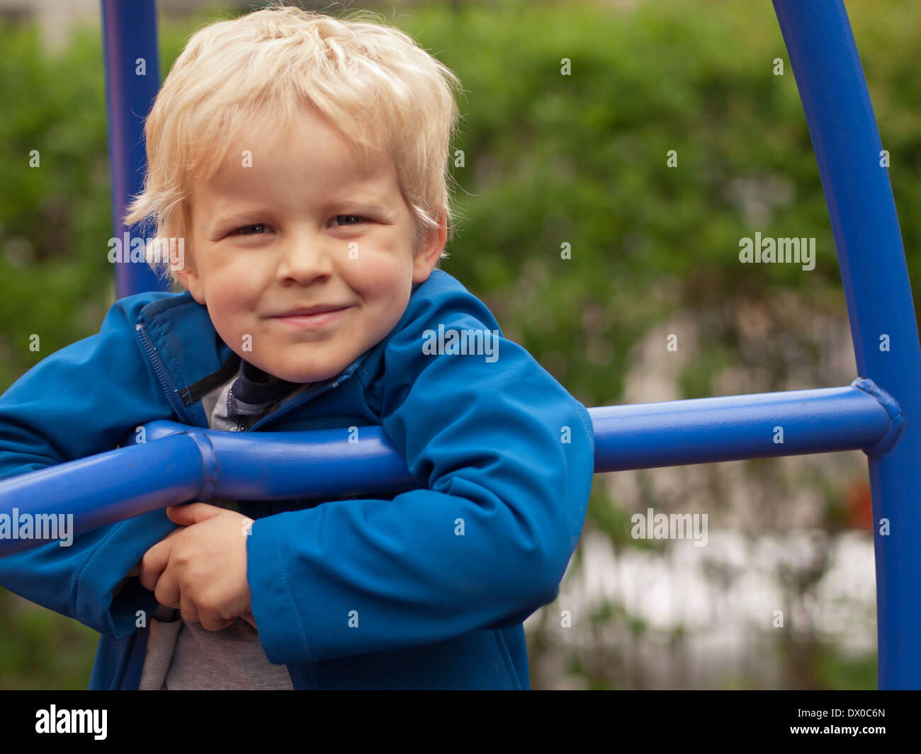 four year old boy at the playground smiling into camera Stock Photo - Alamy