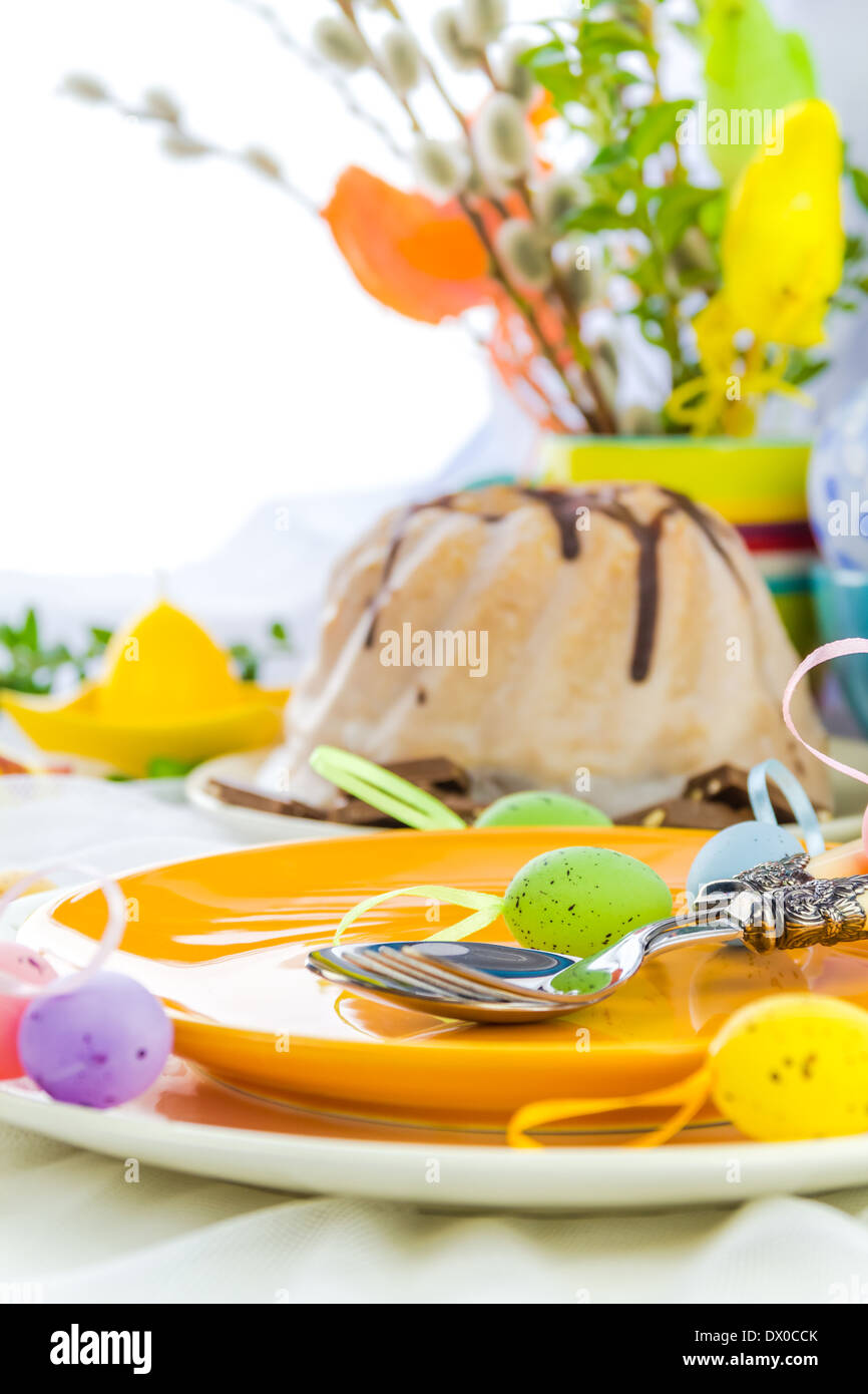 Serving Easter table with cake and eggs Stock Photo - Alamy