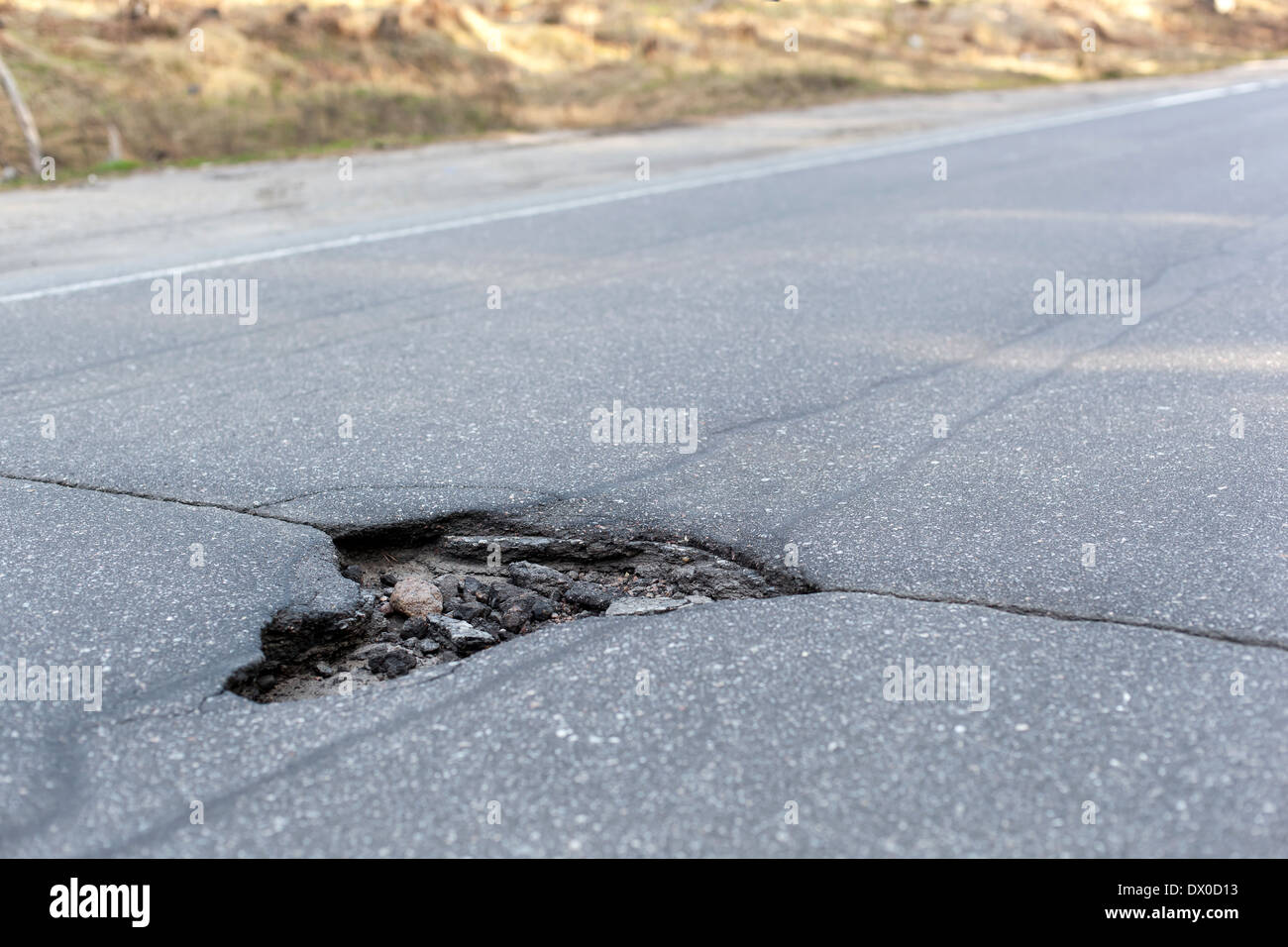 Pot hole in asphalt hi-res stock photography and images - Alamy