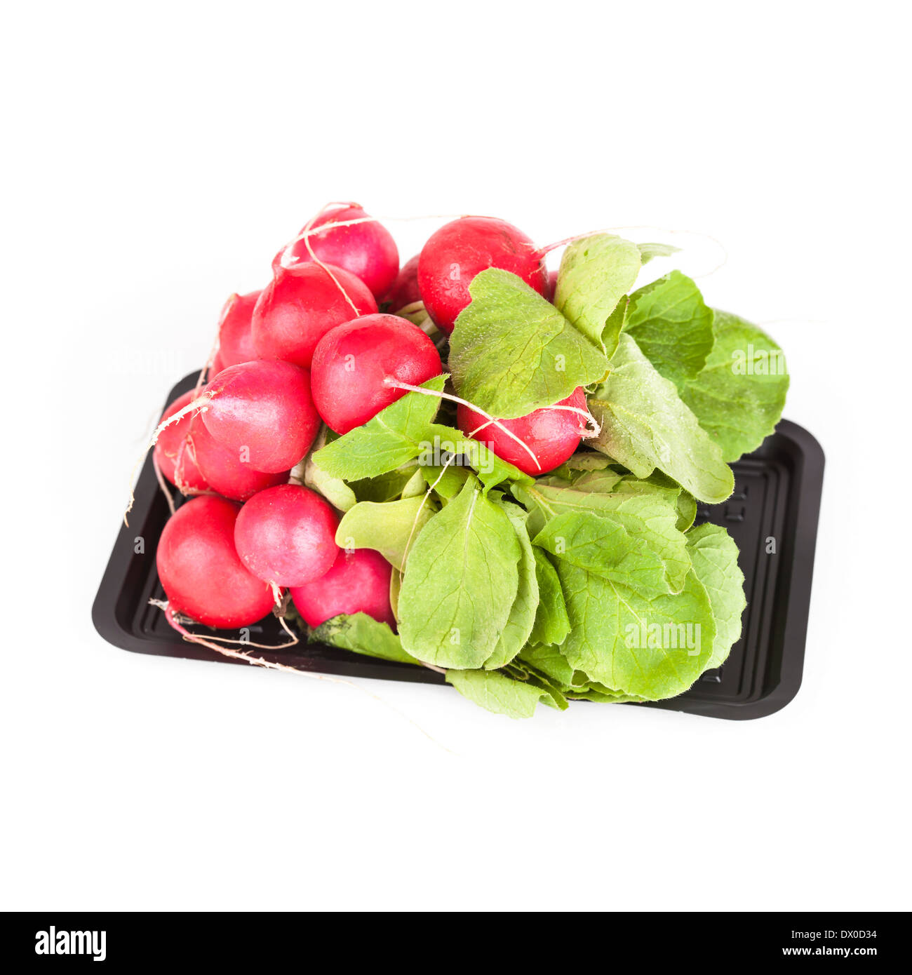 Pile of garden radish, closeup on white background Stock Photo - Alamy